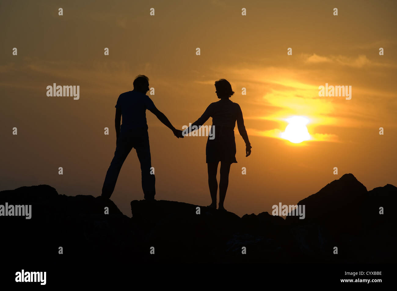 Romantic couple beautiful sunset on hi-res stock photography and images ...