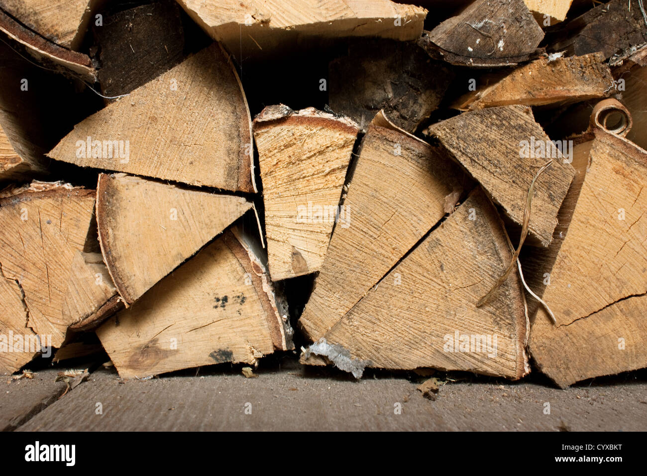 Stack of chopped firewood prepared for burning. End view Stock Photo ...