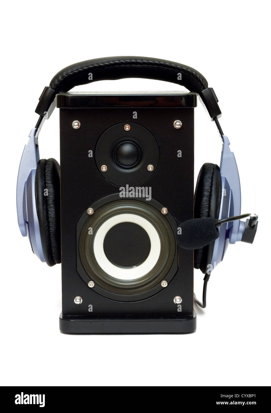 Headphones on a speaker isolated on white. Listening to music and ...