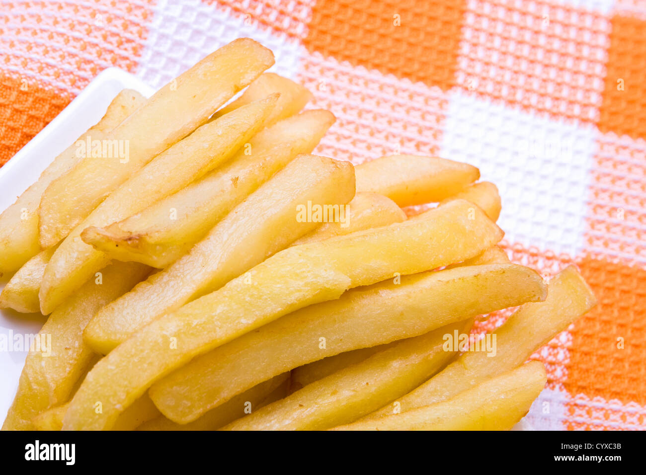 Hot oven chips on a plate Stock Photo - Alamy