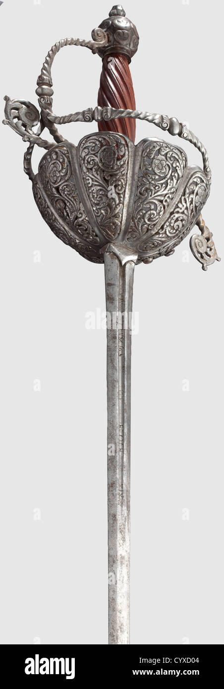 A chiselled Italian cup-hilt rapier,mid 17th century Double-edged blade ...