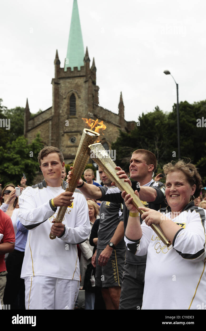 Lady running with the olympic torch hi-res stock photography and images ...