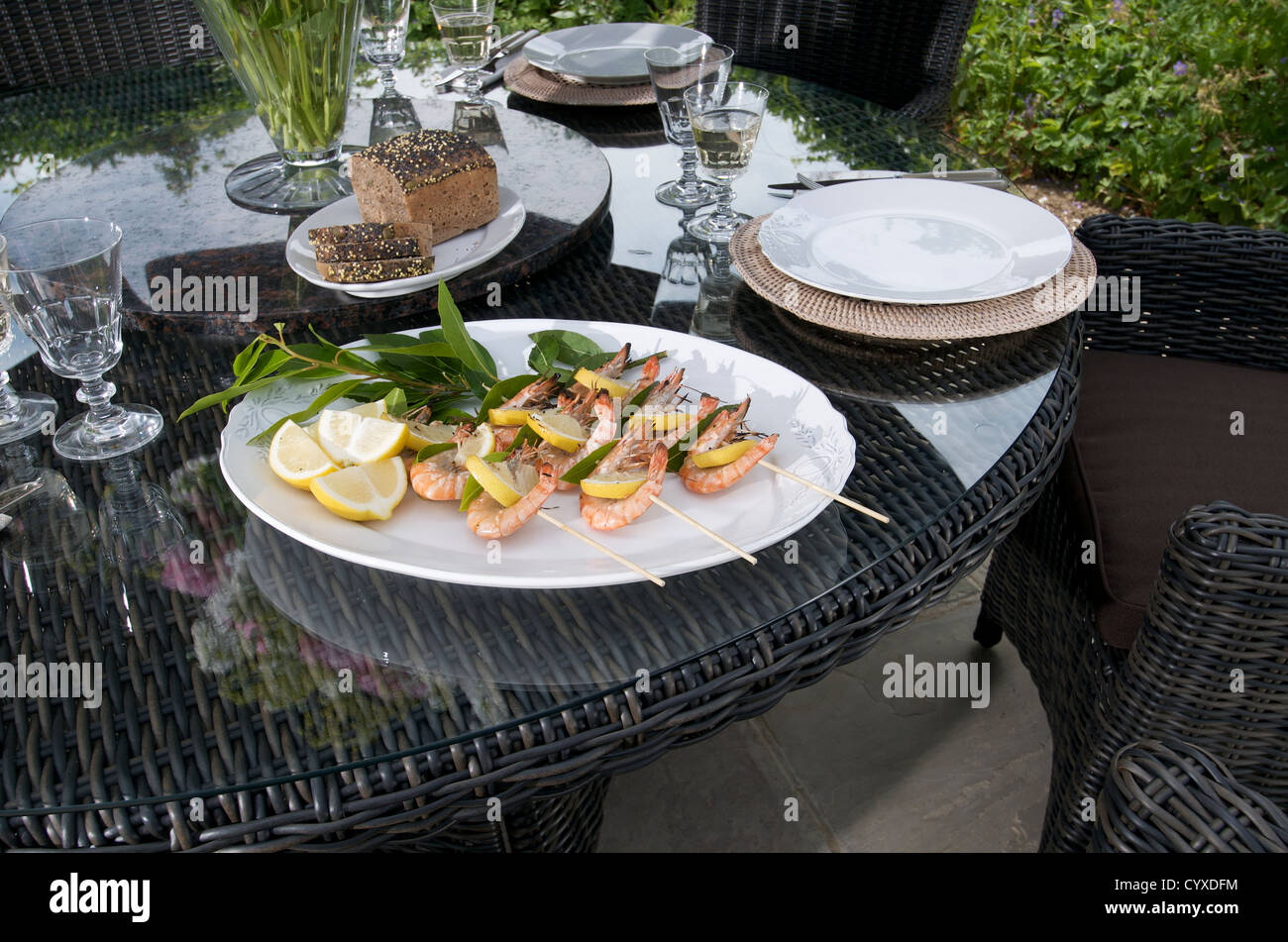 Table laid for outdoor lunch Stock Photo - Alamy