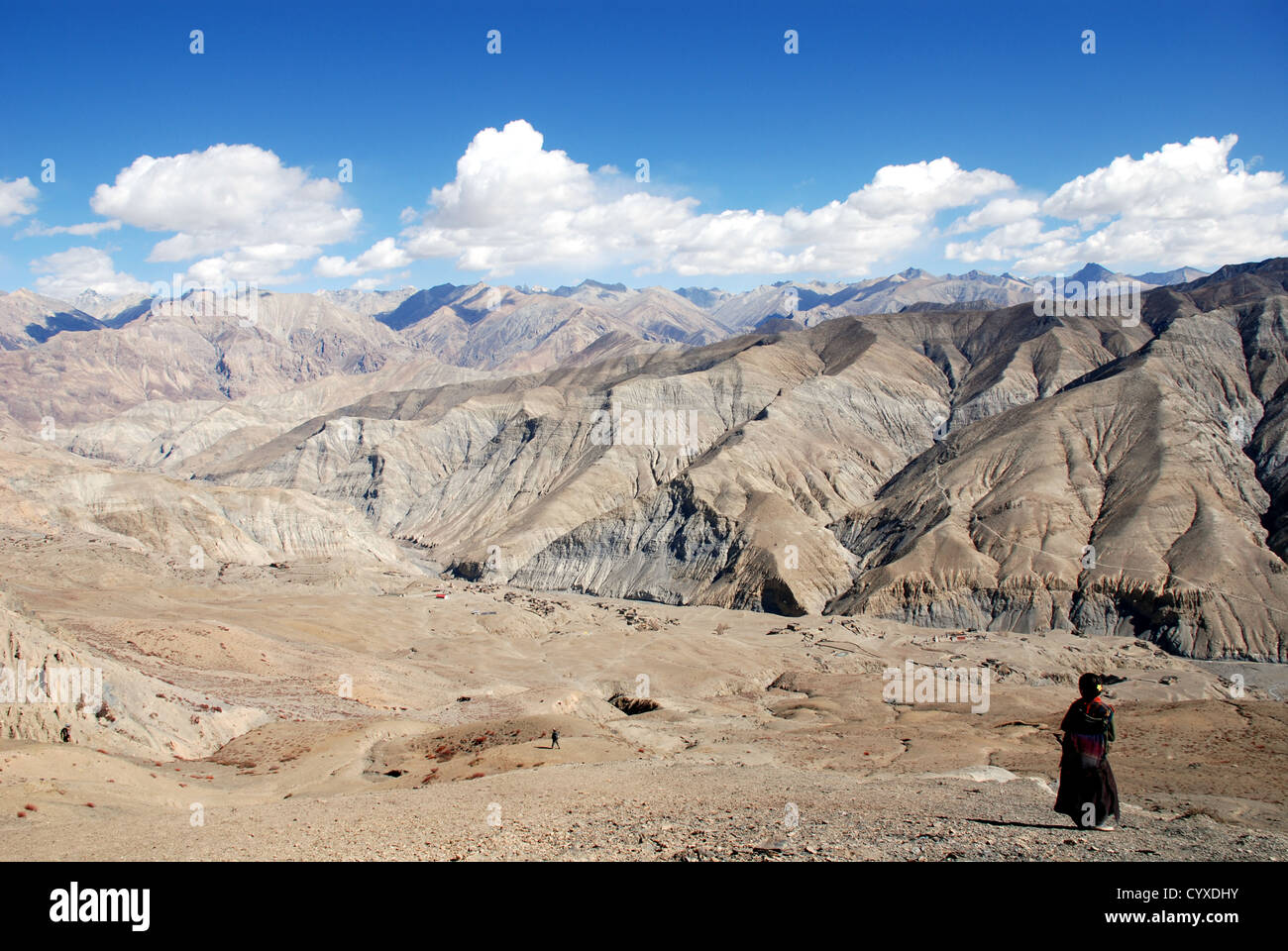 A woman crossing the Shey La pass in the Inner Dolpo region of western ...