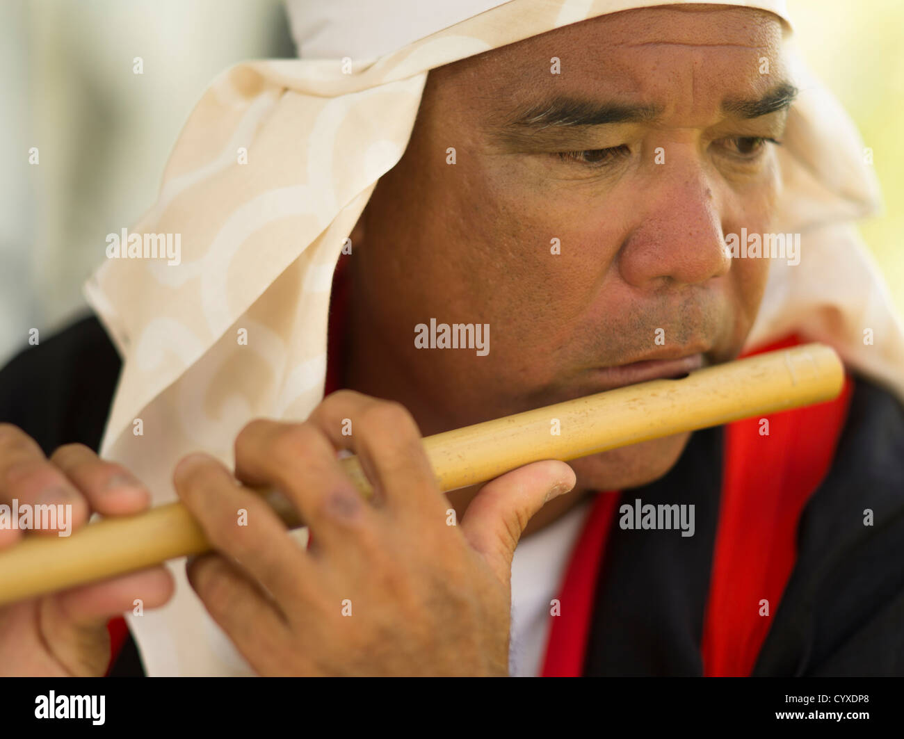 Japanese man playing flute hi-res stock photography and images - Alamy
