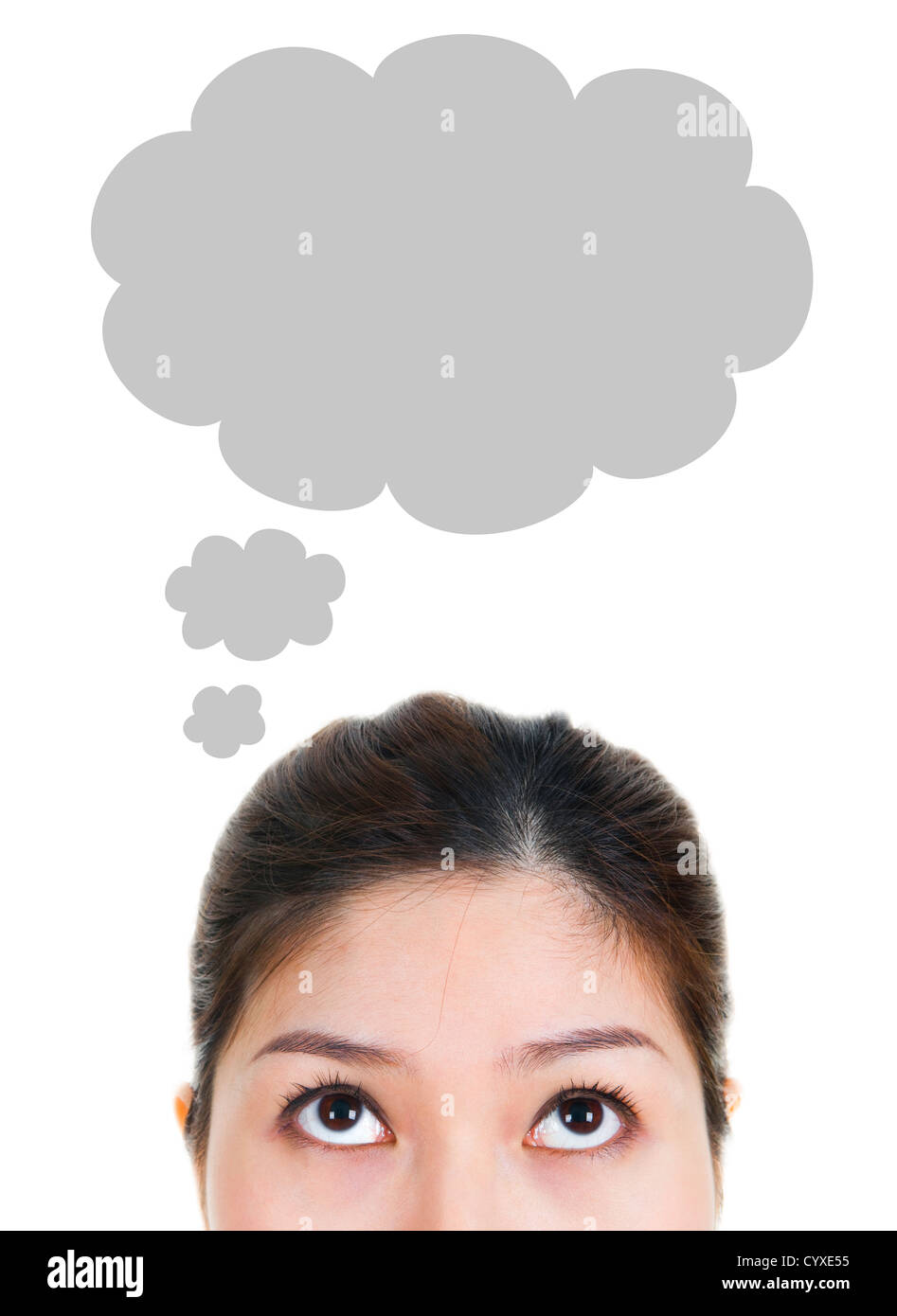 Young Asian woman looking up having thought Stock Photo - Alamy