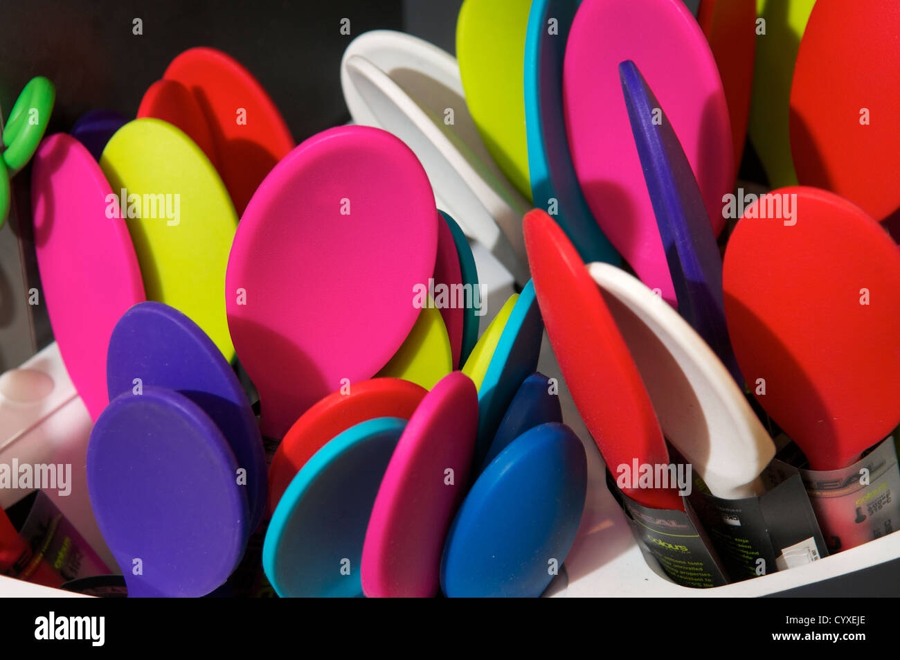 Coloured cooking spoons Stock Photo - Alamy