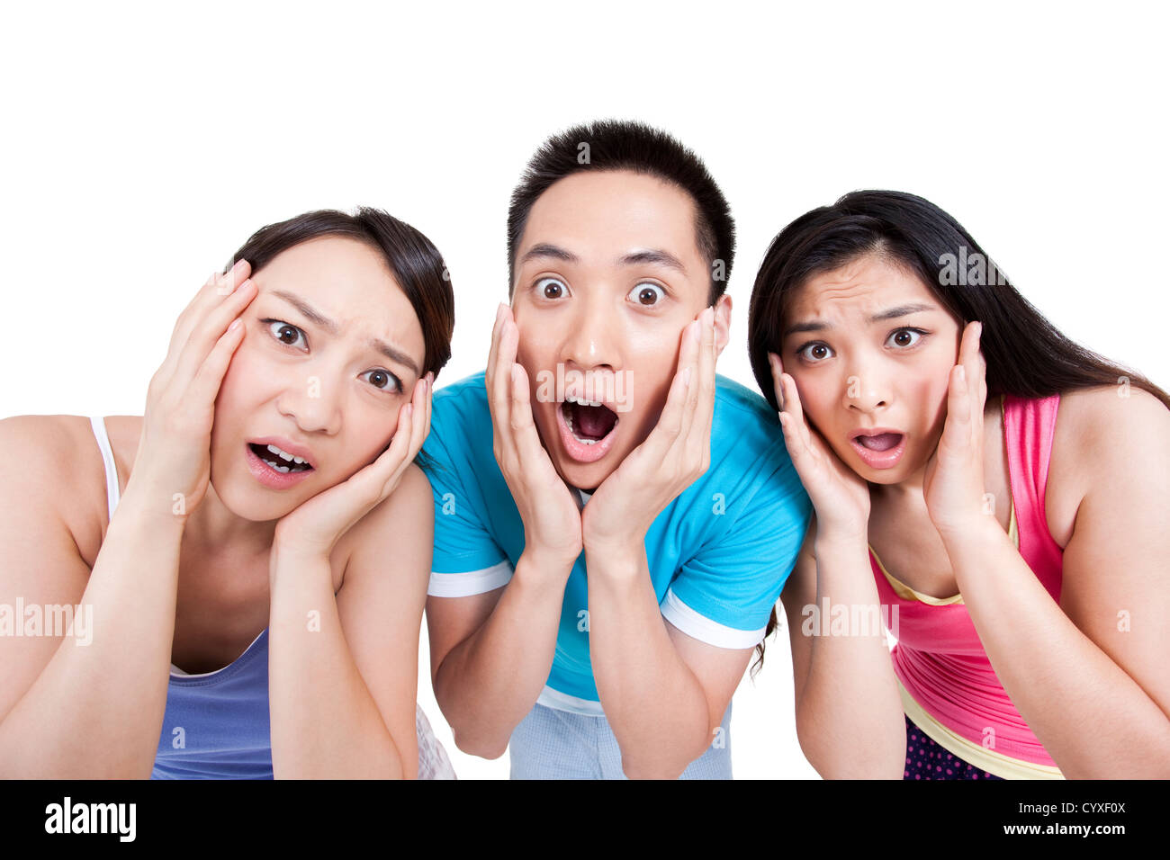 Young people with surprised look Stock Photo - Alamy