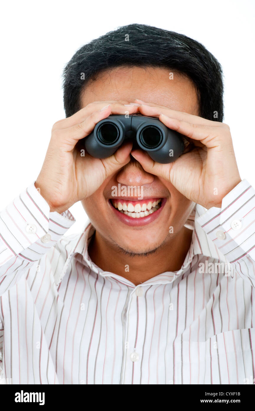 Man looking holding telescope hi-res stock photography and images - Alamy