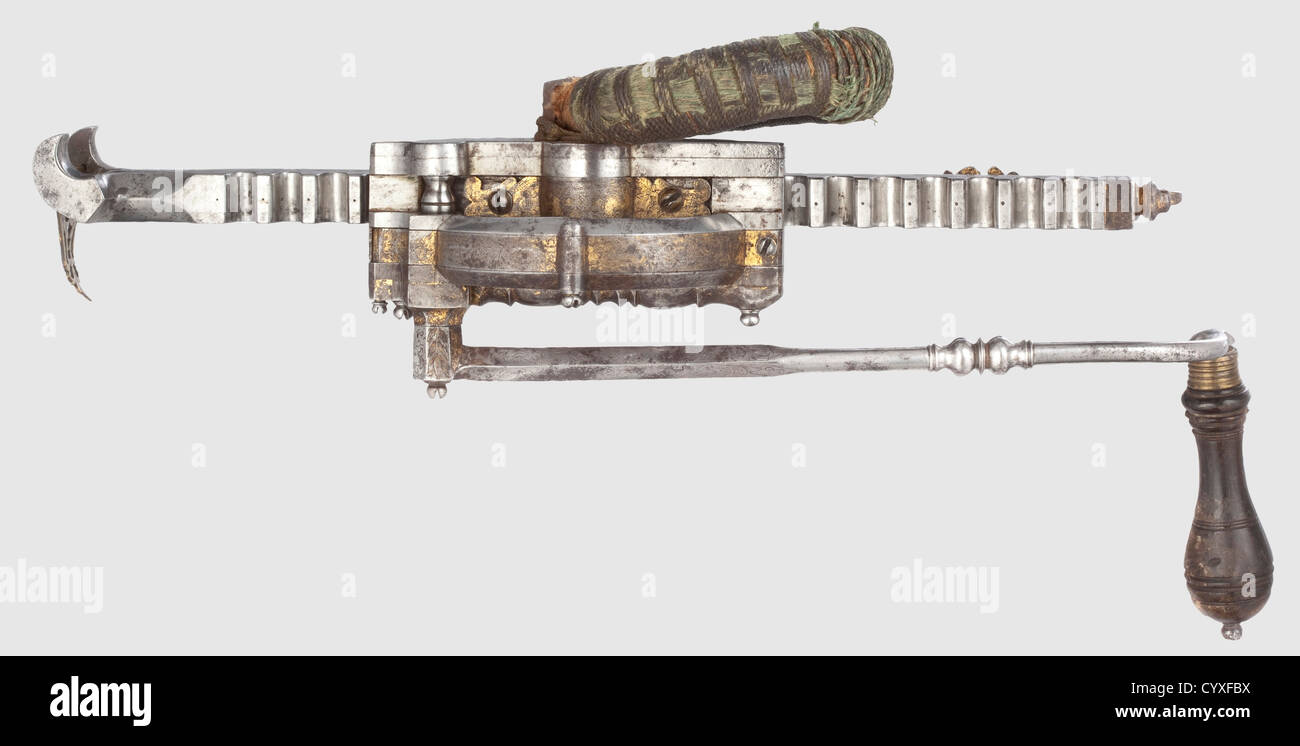 An etched saxon crossbow cranequin with gold inlay hi-res stock ...