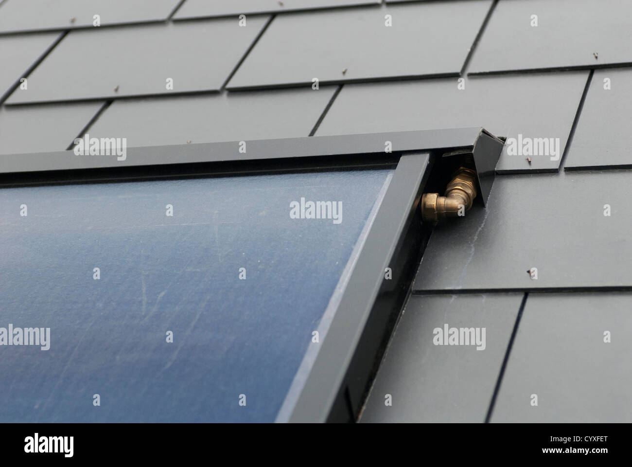 Water pipe connection to a solar hot water panel on a new house roof ...