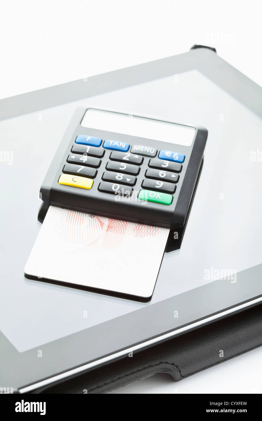 Tan generator with card on white background Stock Photo - Alamy