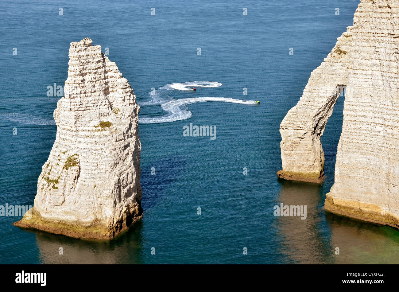 Famous cliffs with the pointed Needle and the natural arche the "Porte ...