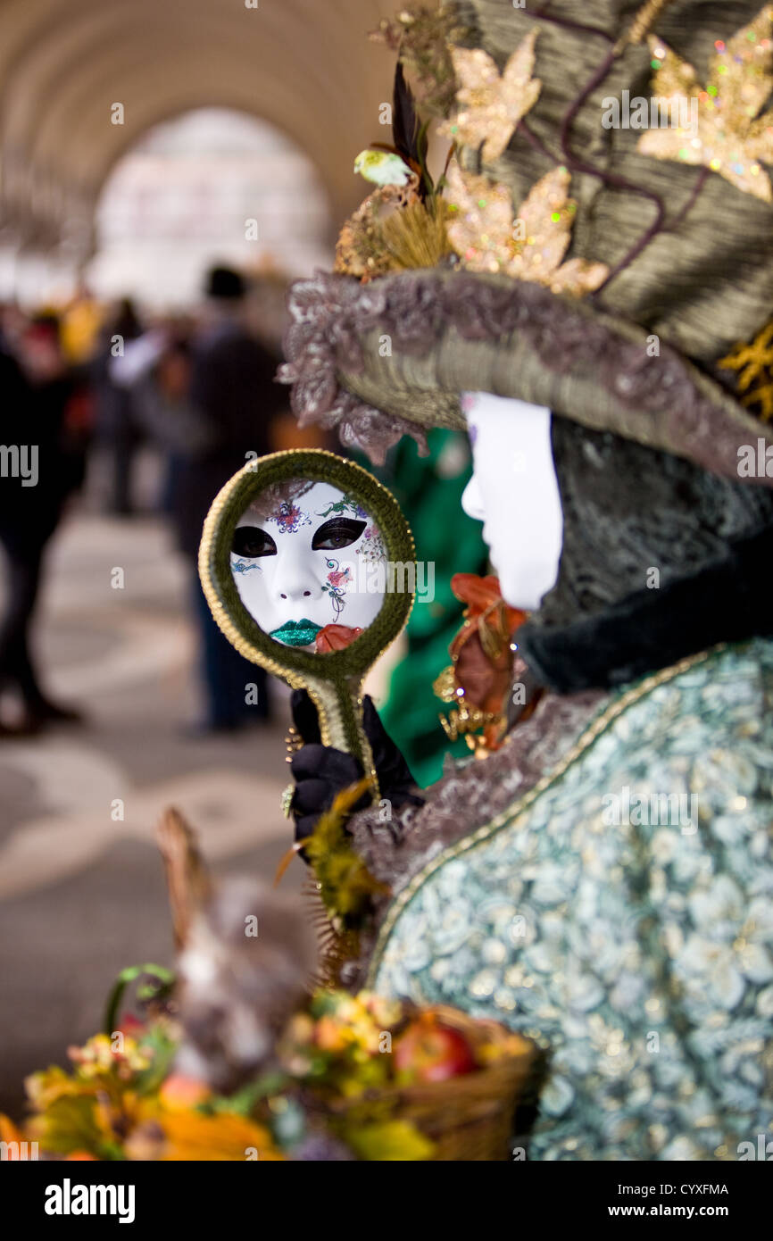 Reflection of a mask in a mirror at the Venice Carnival Stock Photo - Alamy