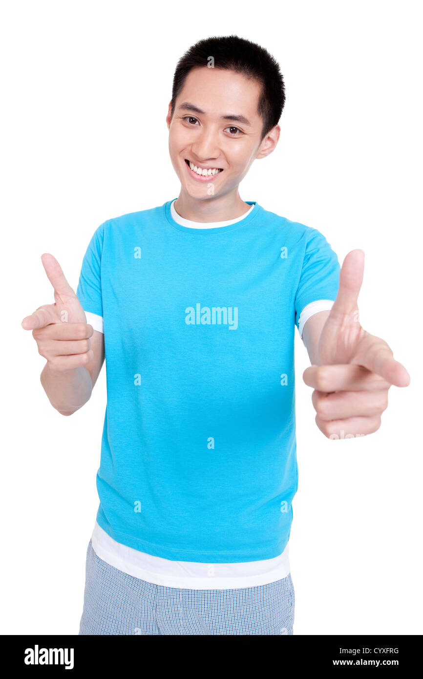 Happy young man pointing Stock Photo - Alamy