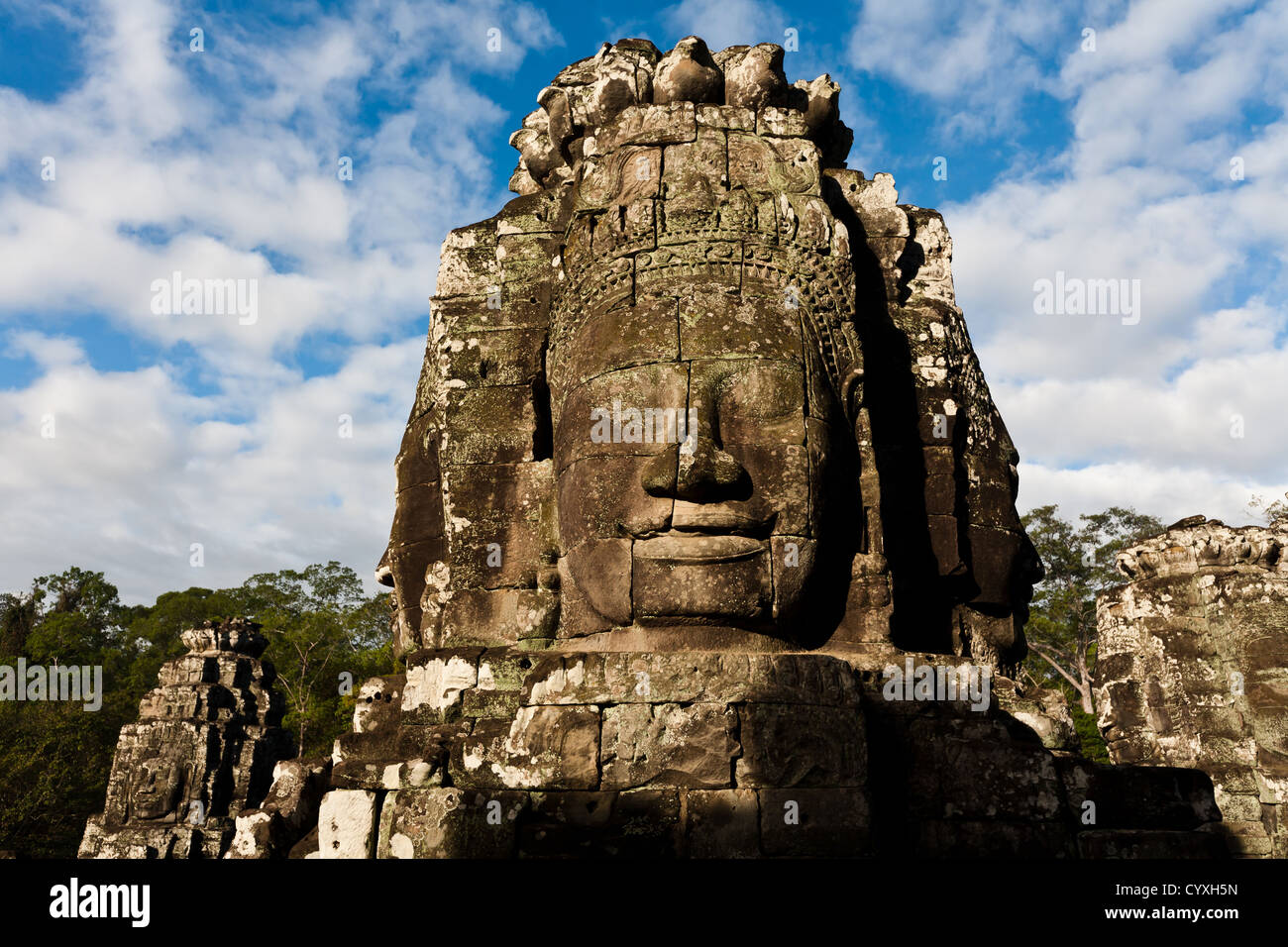 Famous head statue of ancient Prasat Bayon temple at Angkor Wat in SIEM ...