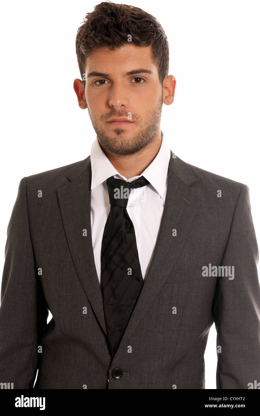 Young businessman looking serious isolated on white background Stock ...