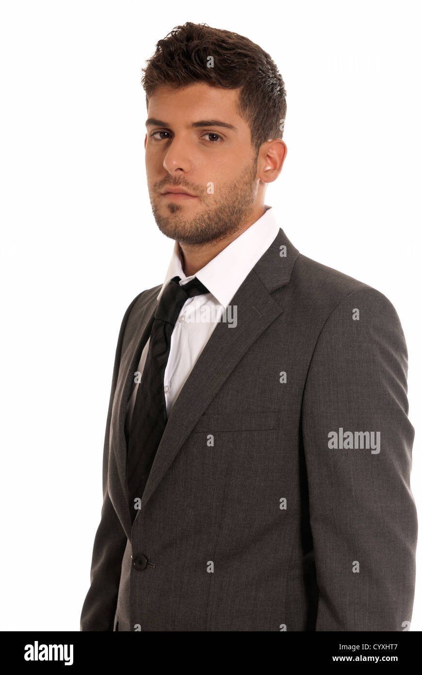 Young businessman looking serious isolated on white background Stock ...