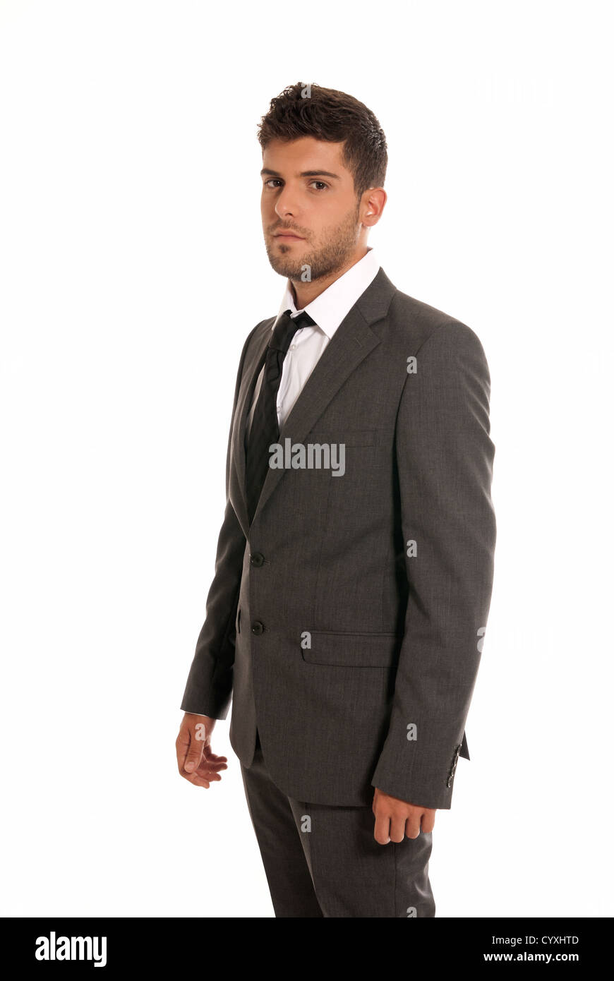 Young businessman looking serious isolated on white background Stock ...