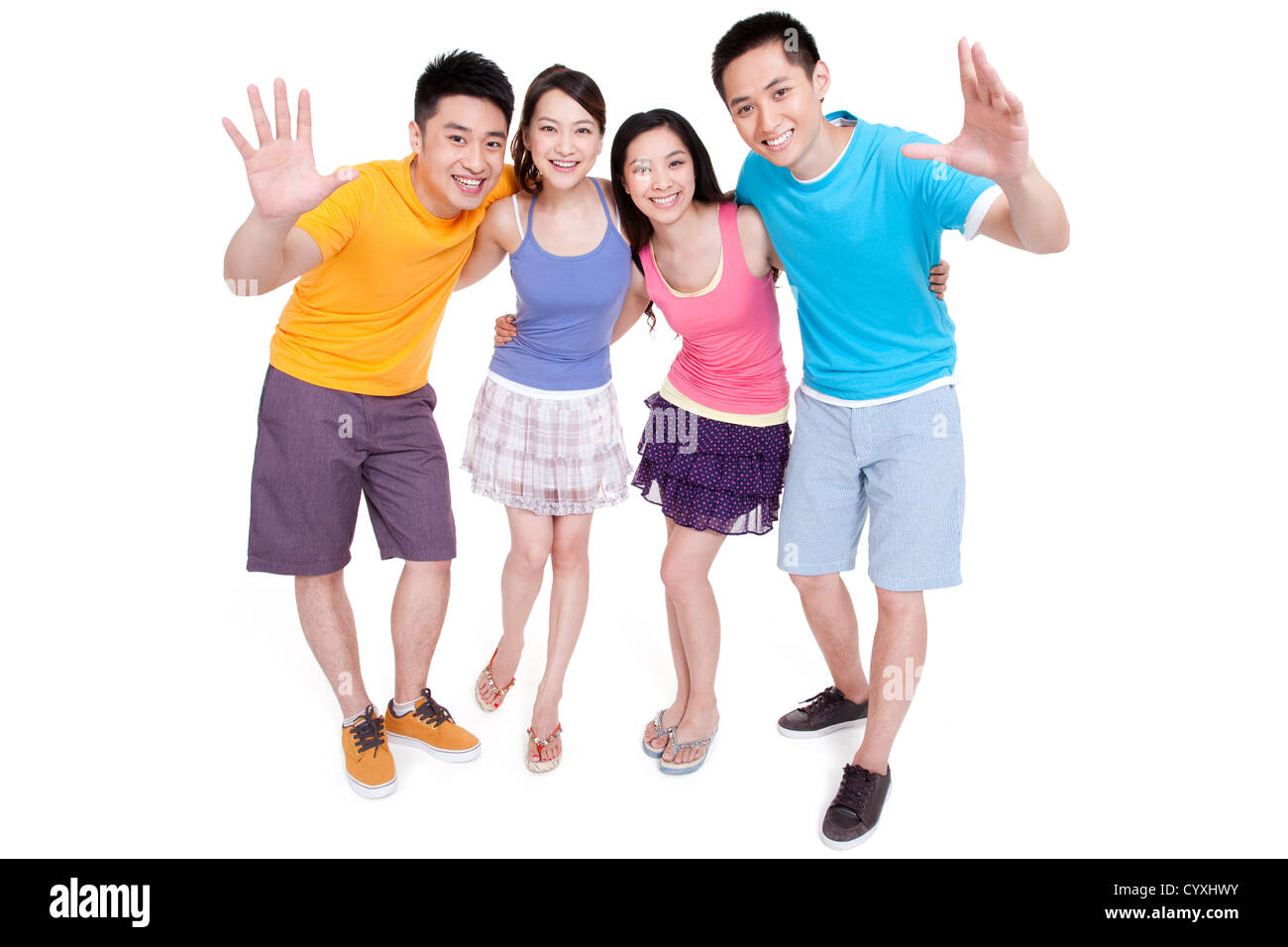 Happy young people arms around each other and waving Stock Photo - Alamy