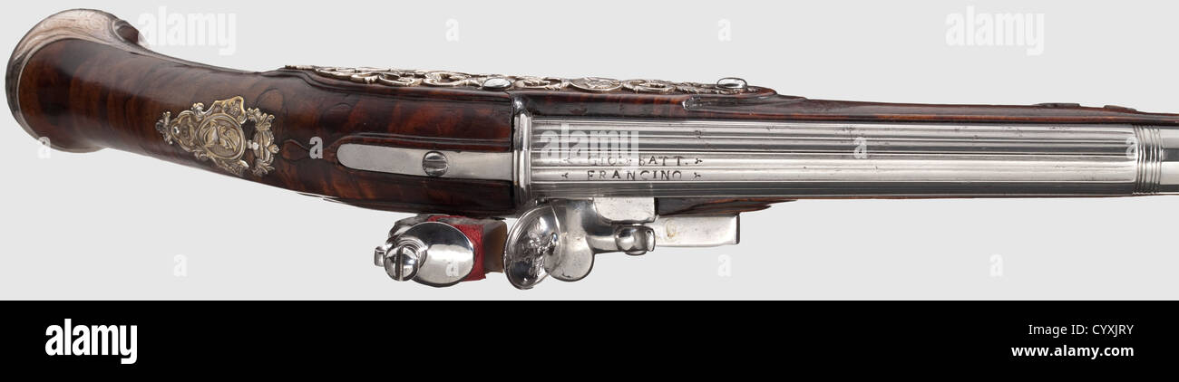 A long Italian flintlock pistol,Italy,circa 1730. Fluted barrel ...