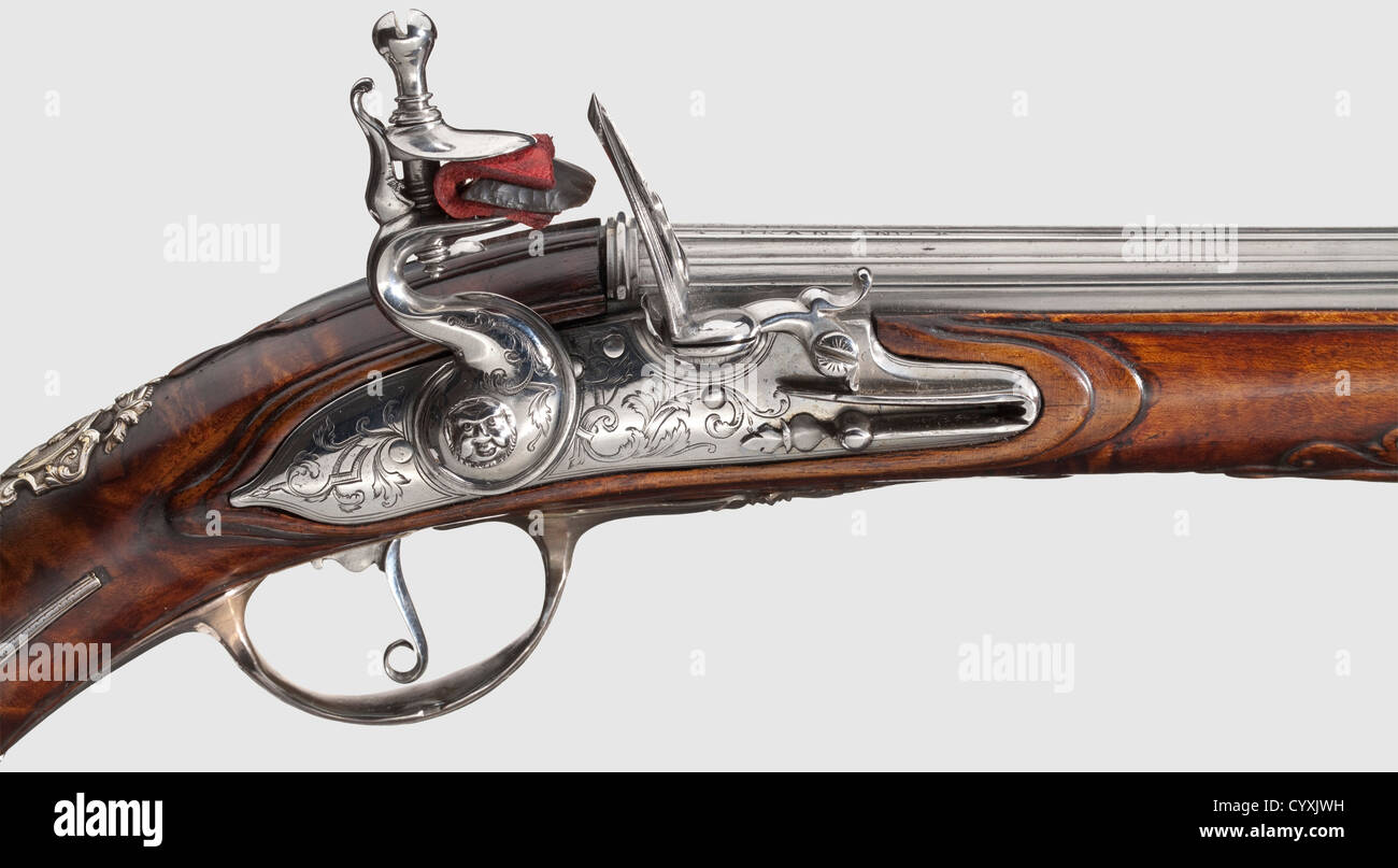 A long Italian flintlock pistol,Italy,circa 1730. Fluted barrel ...