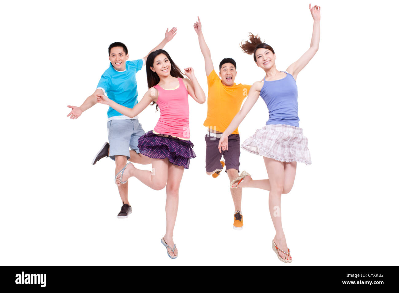 Cheerful young people jumping Stock Photo - Alamy