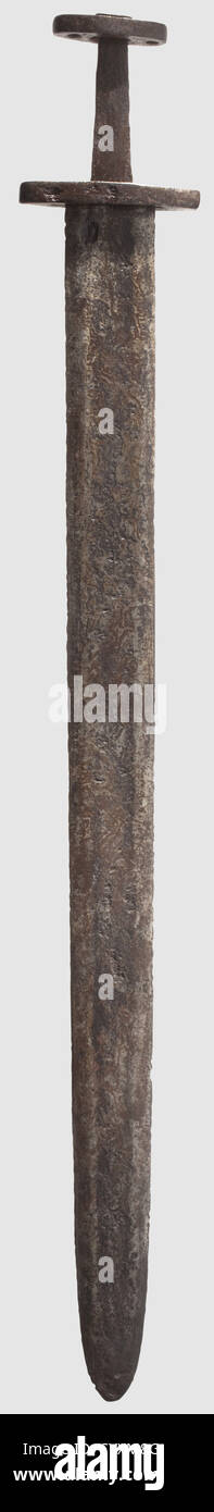 A Frankish sword with a pattern welded blade,7th/8th century A broad ...