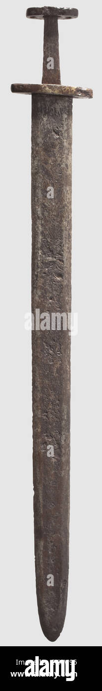 A Frankish sword with a pattern welded blade,7th/8th century A broad ...