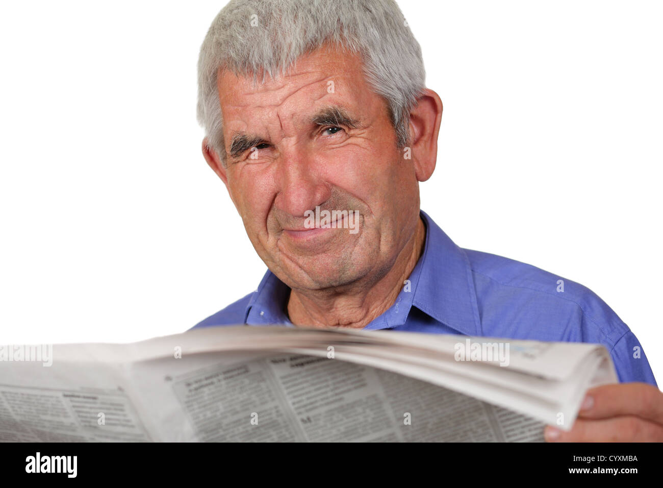 Senior reading a newspaper on a white background Stock Photo - Alamy