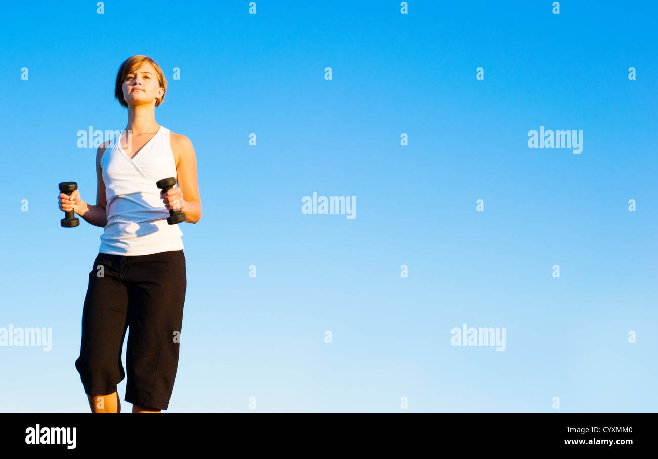 Woman walking weights outside hi-res stock photography and images - Alamy