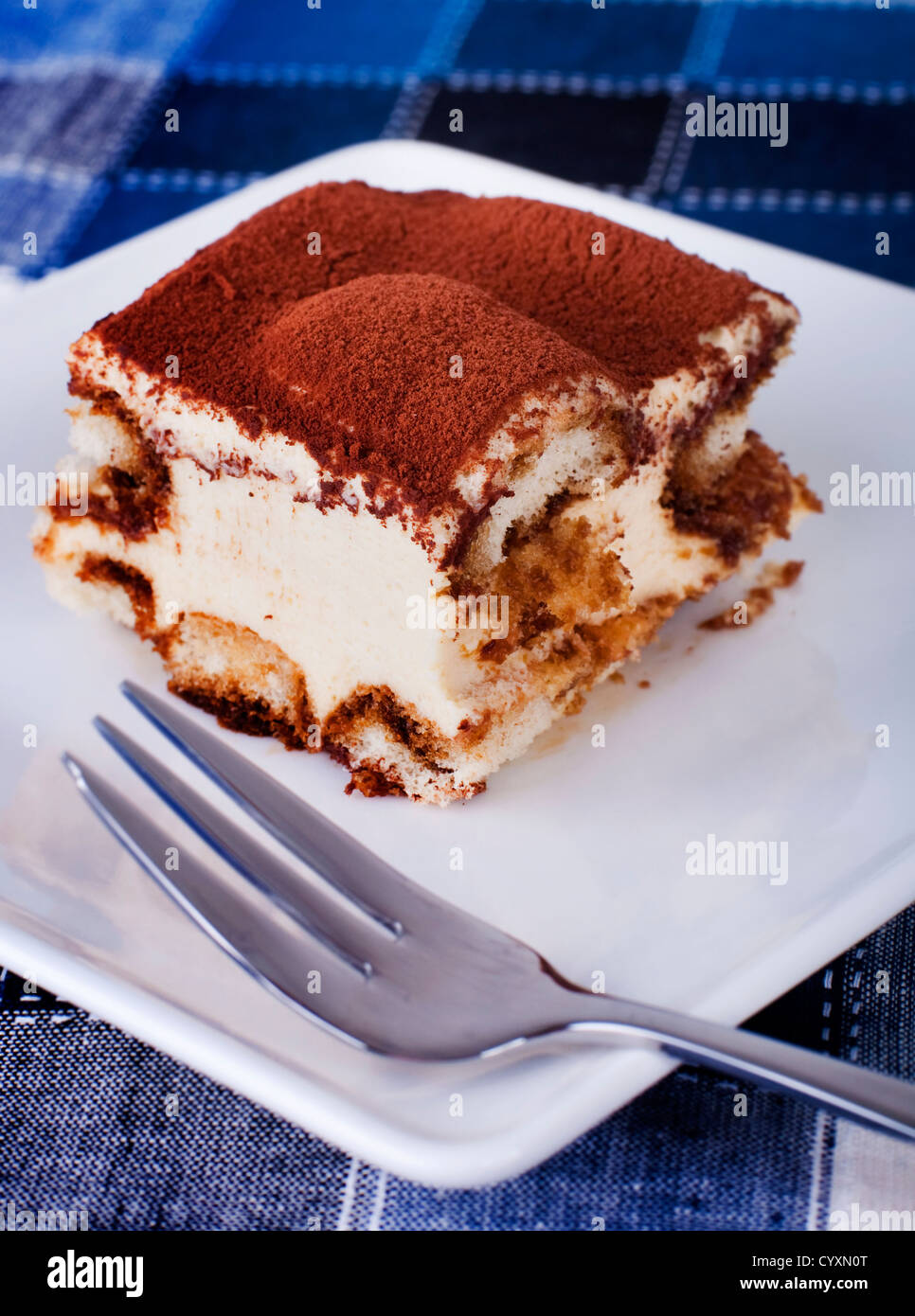 Portion of tiramisu on a plate Stock Photo - Alamy