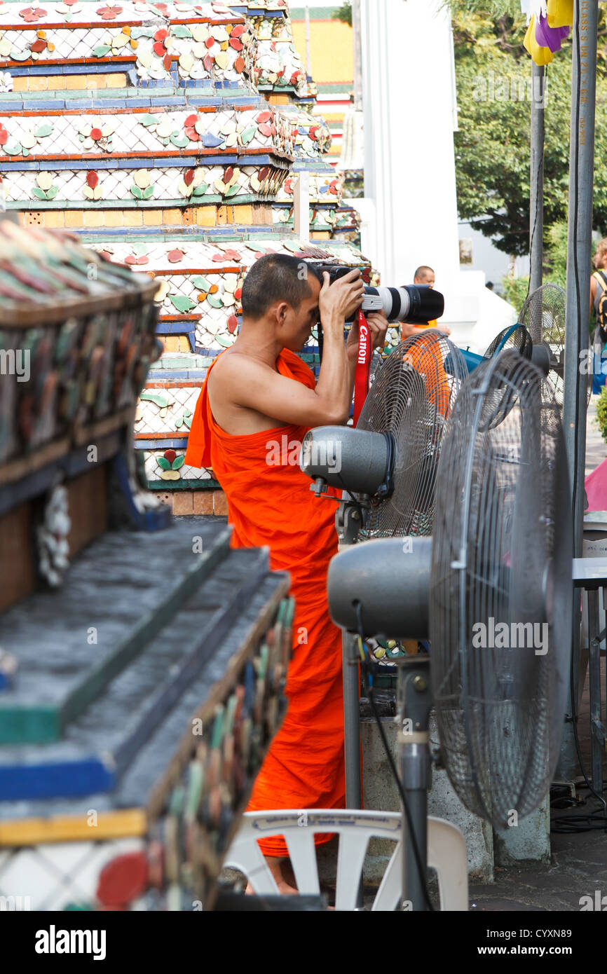 Buddhist Monk with Camera in the Temple Wat Pho in Bangkok, Thailand ...