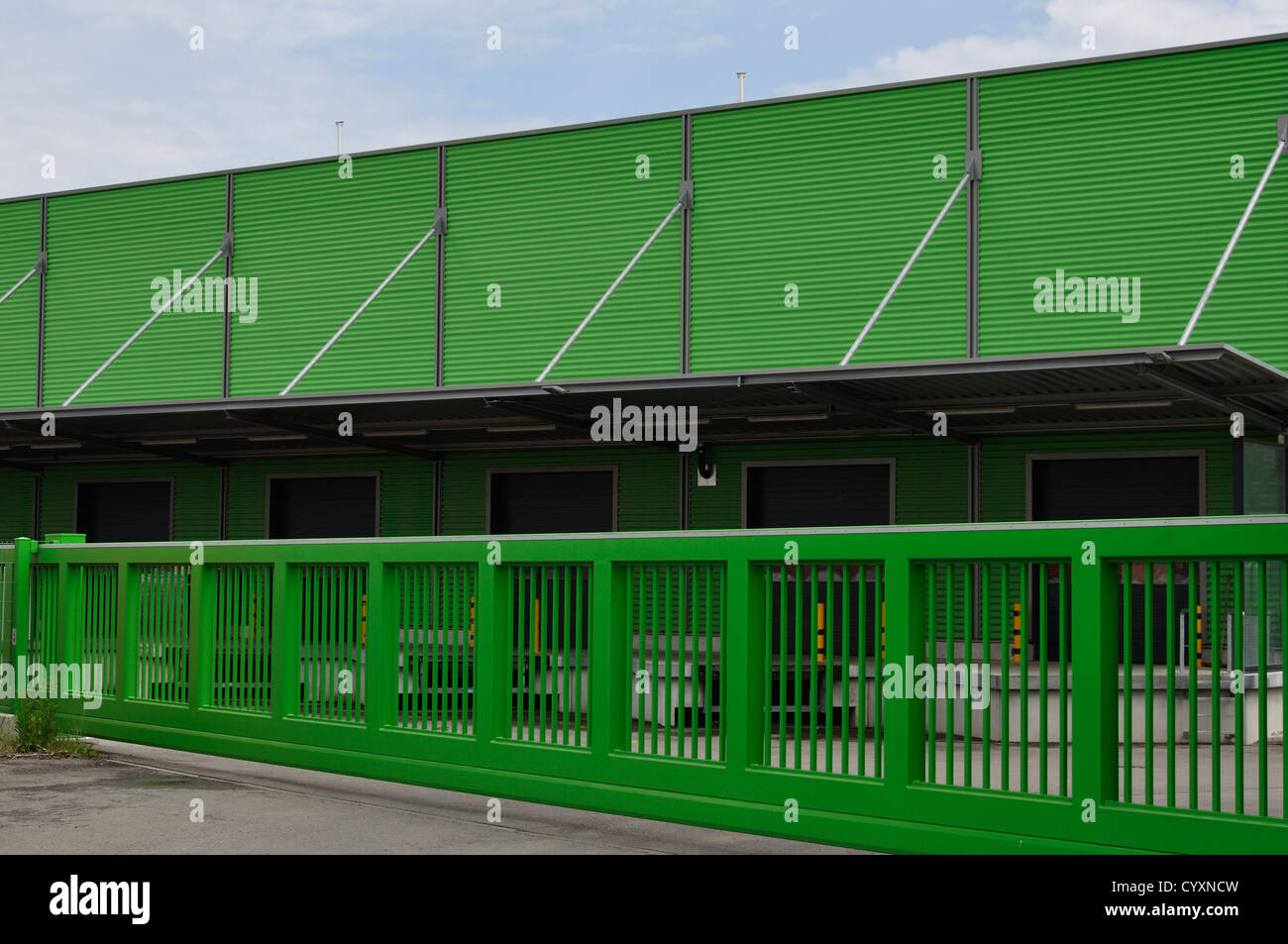 Germany, Bavaria, View of loading ramp at factory building Stock Photo ...