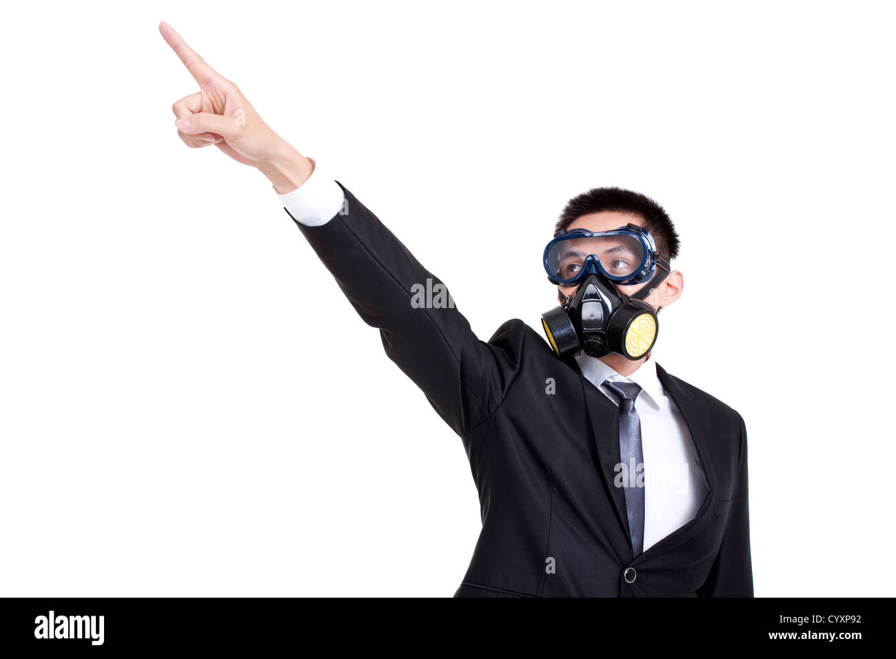 Young businessman with gas mask pointing afar Stock Photo - Alamy