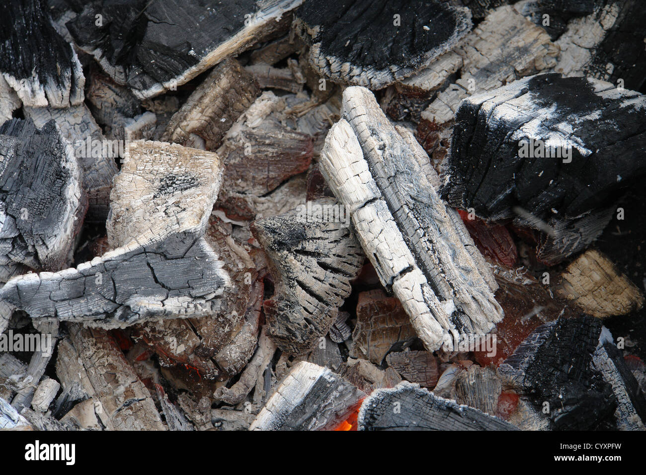 Fire ash and ember in fire place Stock Photo - Alamy