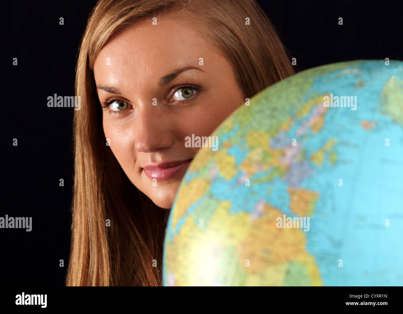 Person globe hi-res stock photography and images - Alamy