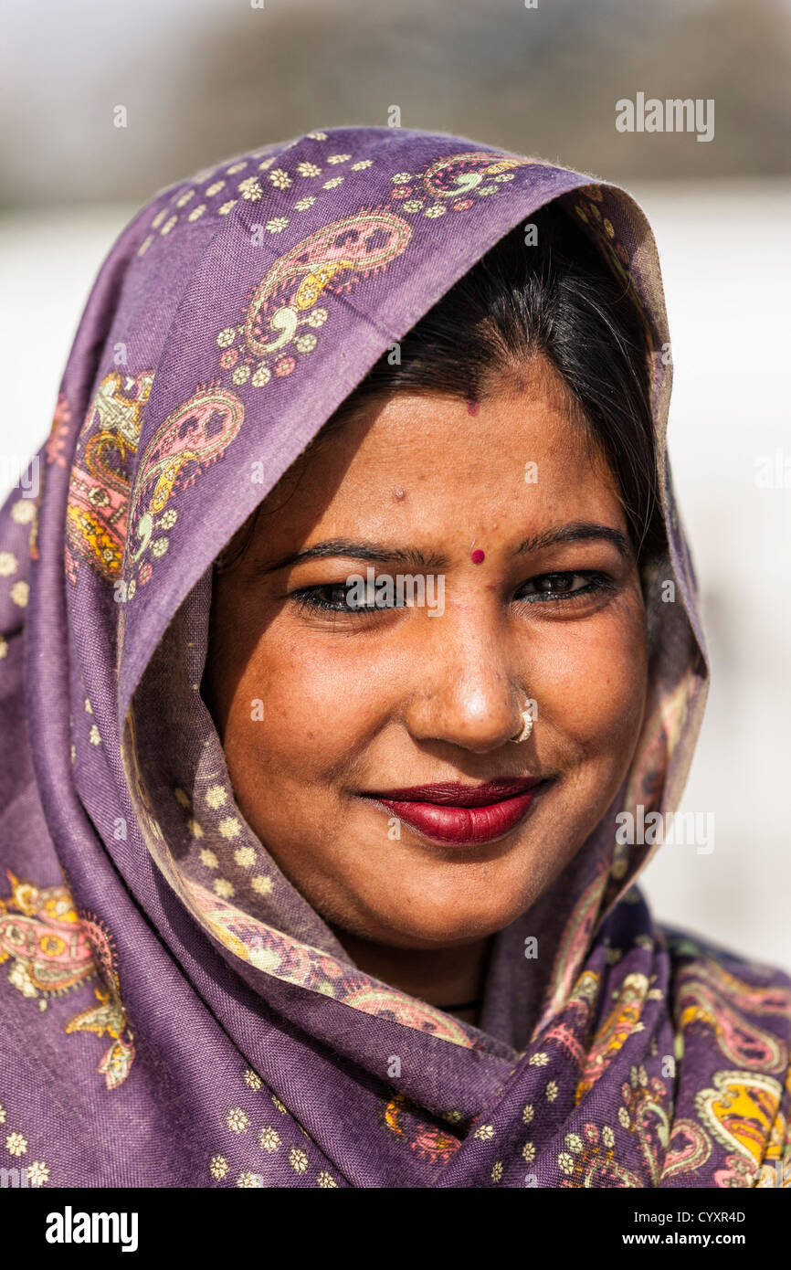 India, Delhi, Young Sikh woman smiling, portrait Stock Photo - Alamy