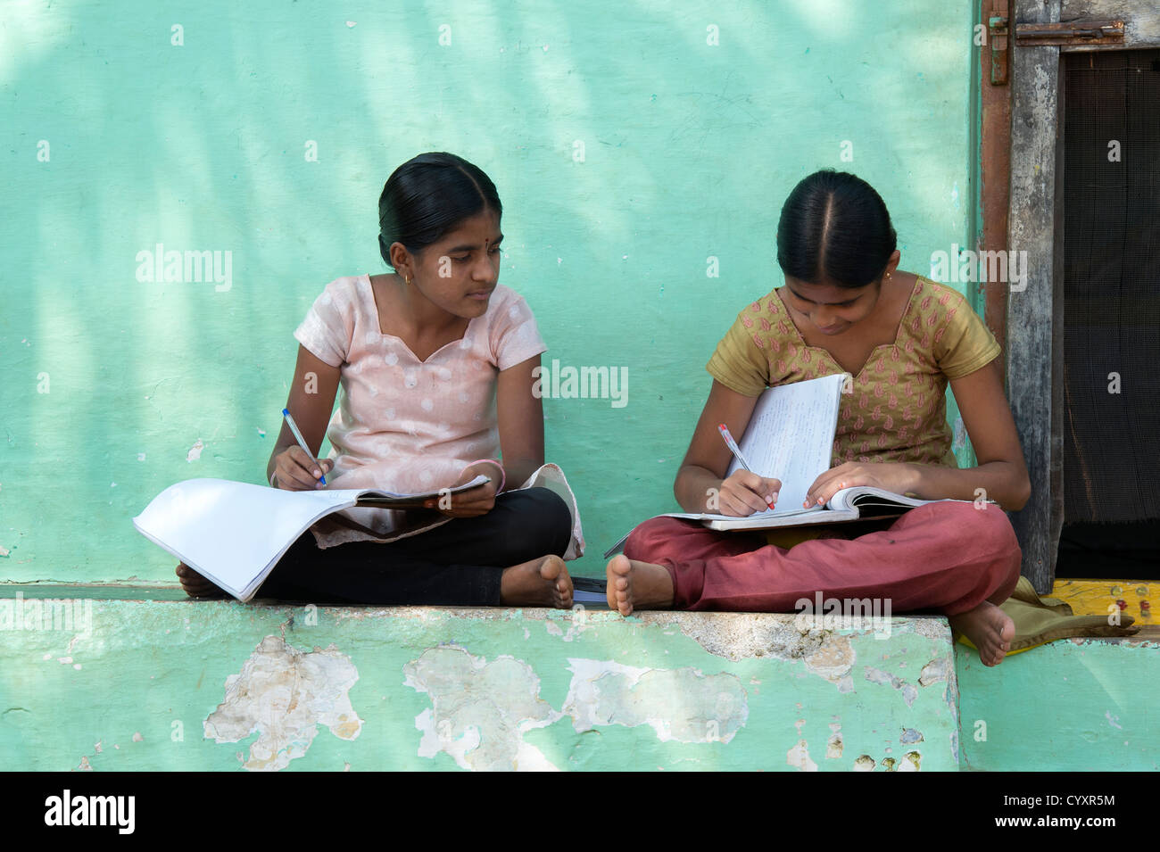 Indian girl writing english hi-res stock photography and images - Alamy