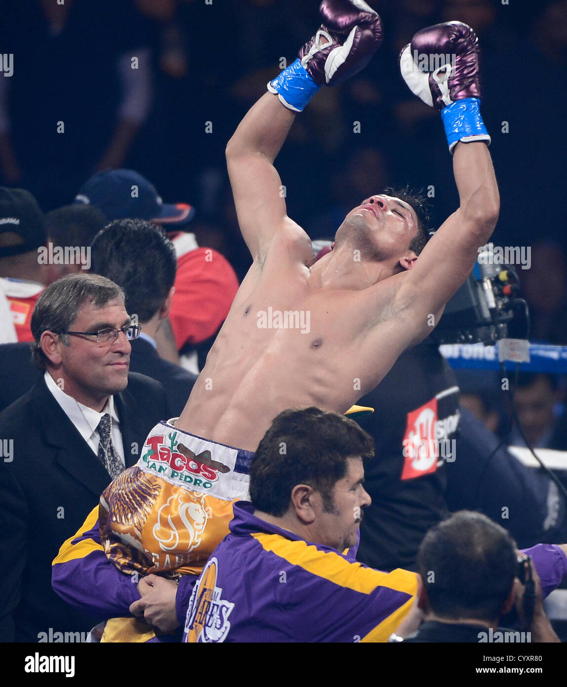 Nov 10,2012. Los Angeles CA.( in purple gloves) Abner Mares fight with ...