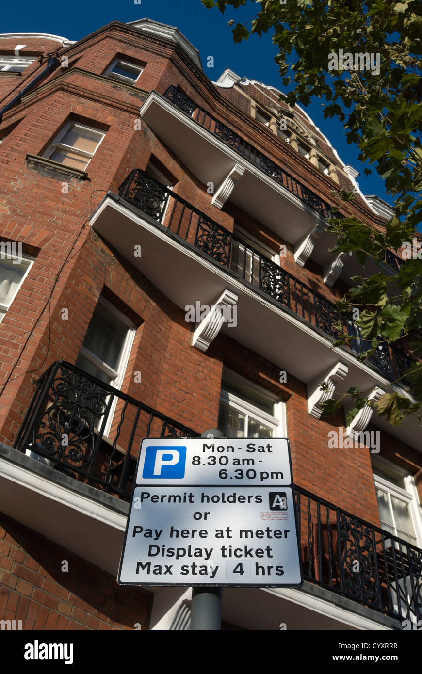 permit holders and pay at meter parking sign in hammersmith, london ...