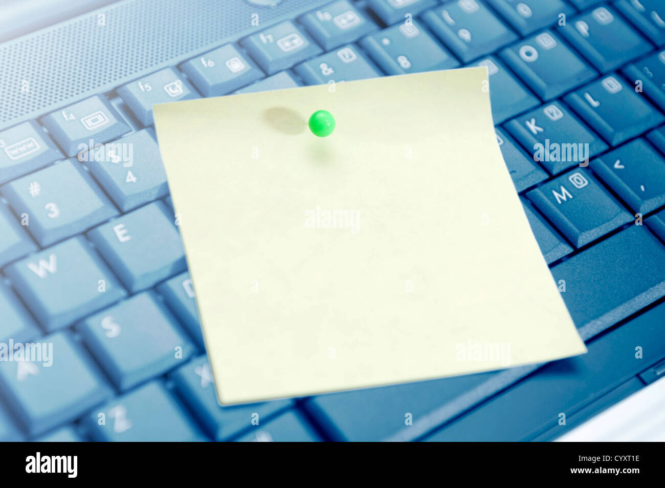 Sticky memo notes on keyboard Stock Photo - Alamy