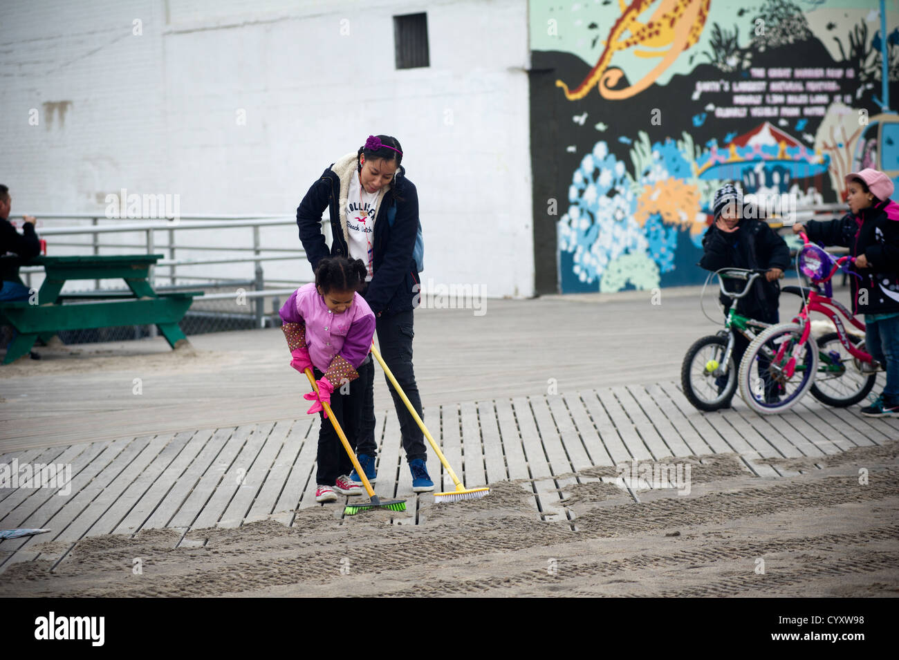 Sweeping Up Sand High Resolution Stock Photography and Images - Alamy