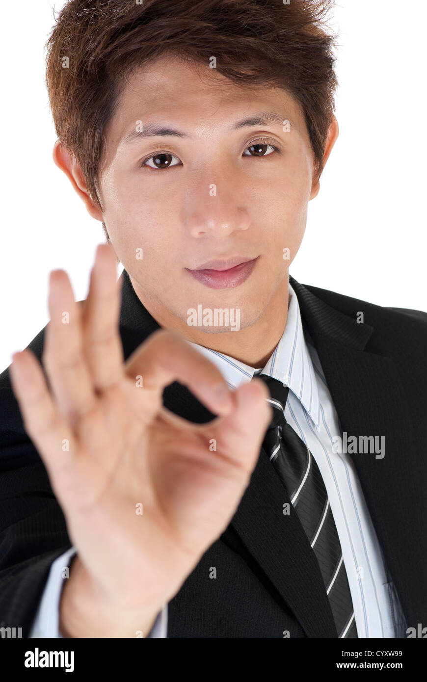 Young executive man give you ok gesture, closeup portrait Stock Photo ...