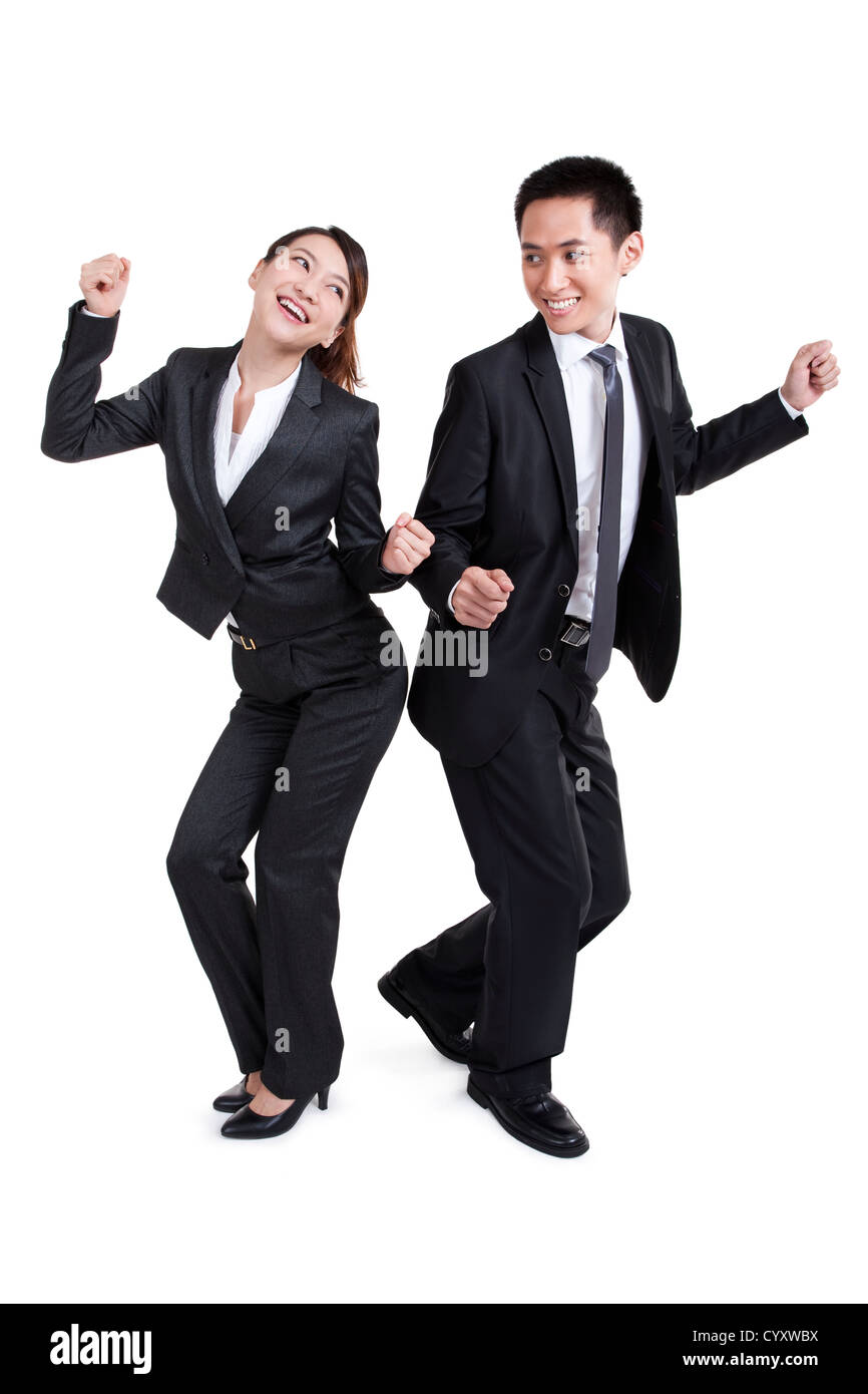 Happy office workers dancing Stock Photo - Alamy