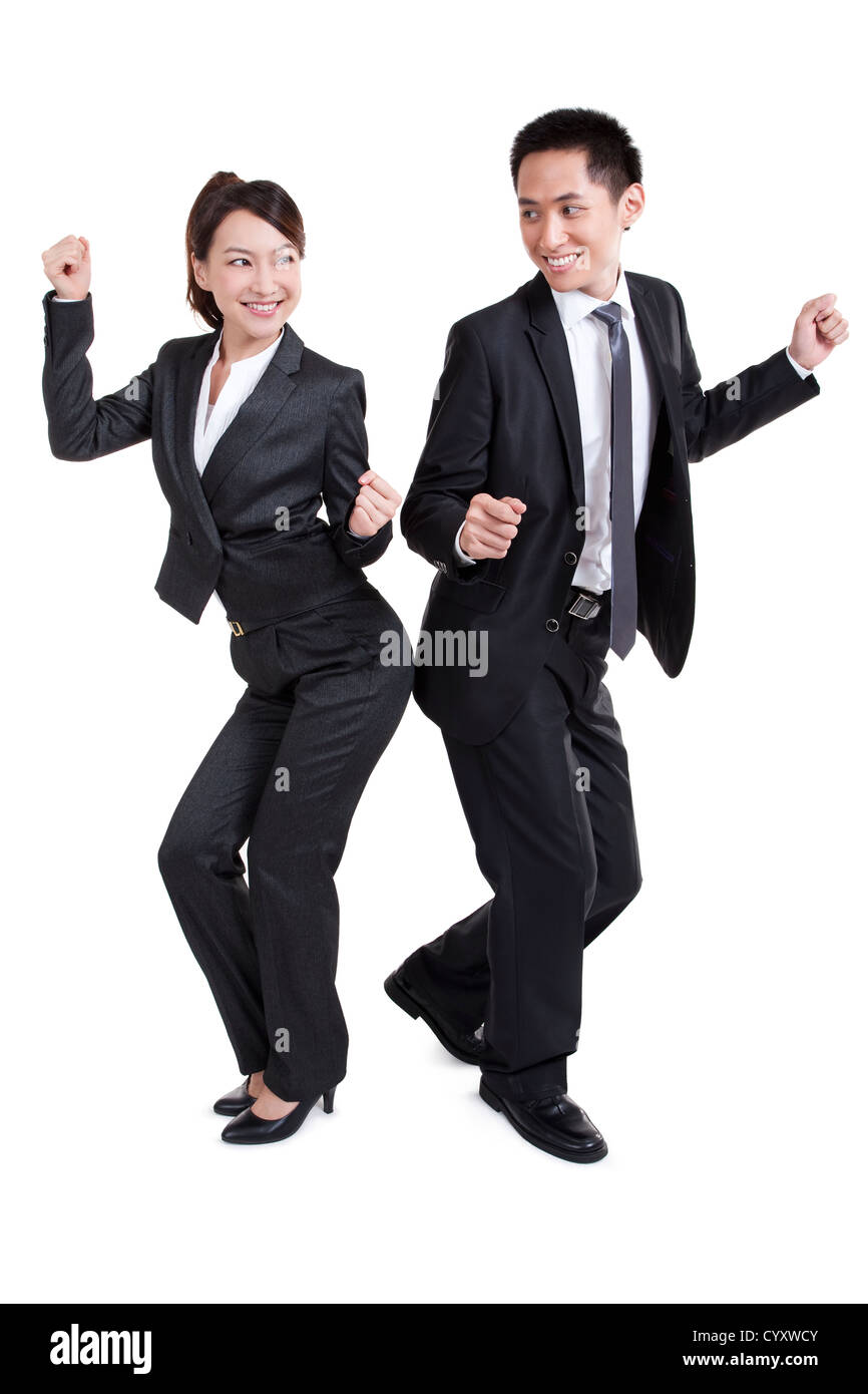Happy office workers dancing Stock Photo - Alamy