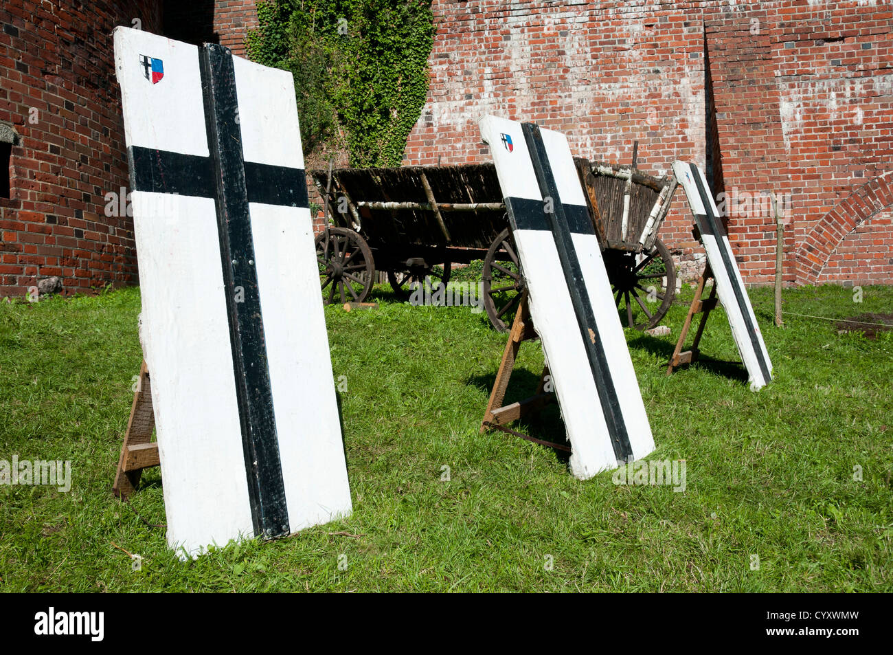 Medieval shields in front of Teutonic castle (14th century) in Malbork ...