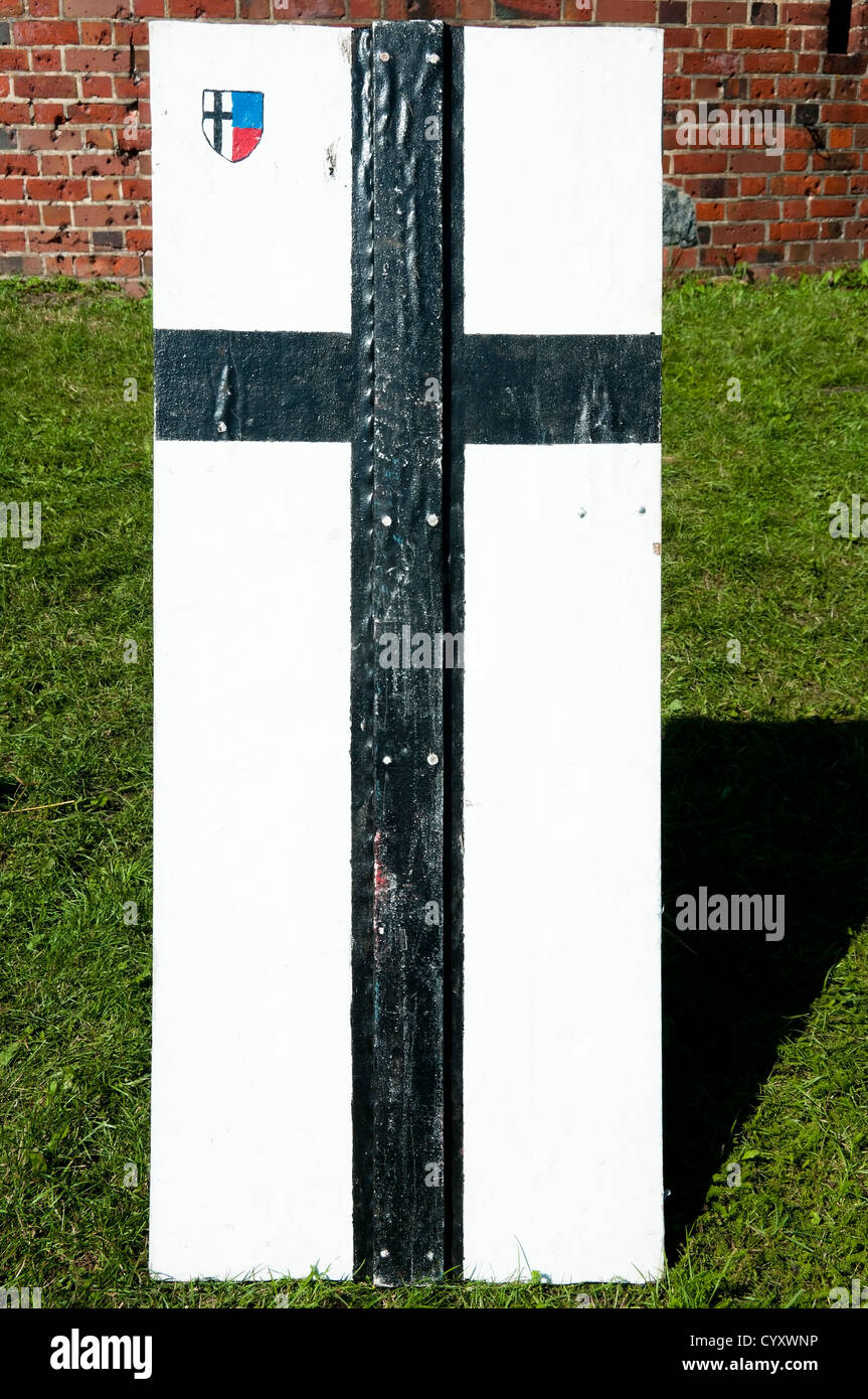 Medieval shield in front of Teutonic castle (14th century) in Malbork ...