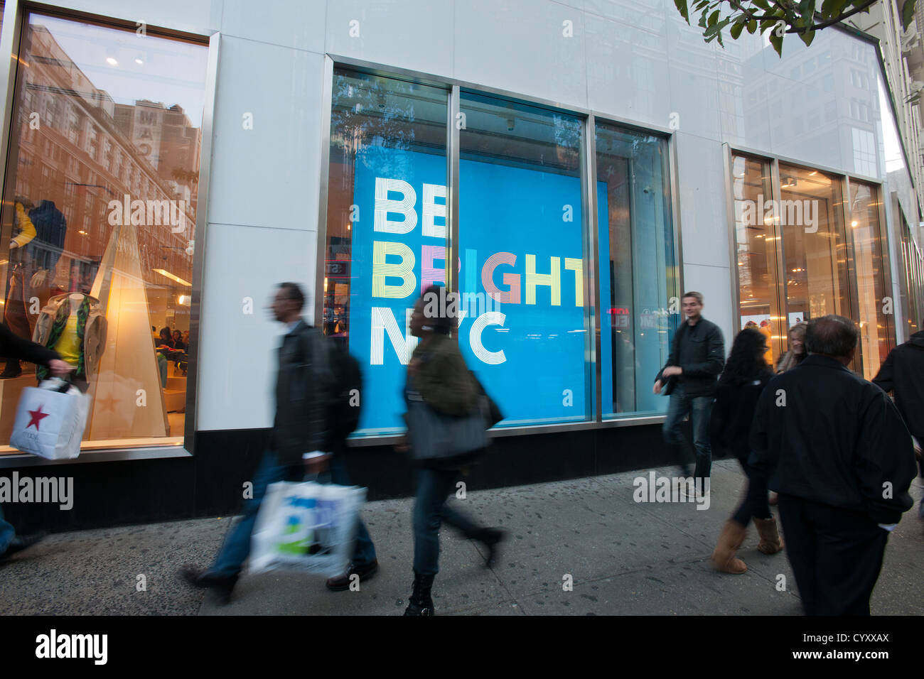 Shoppers outside the Gap store in the Herald Square shopping district ...