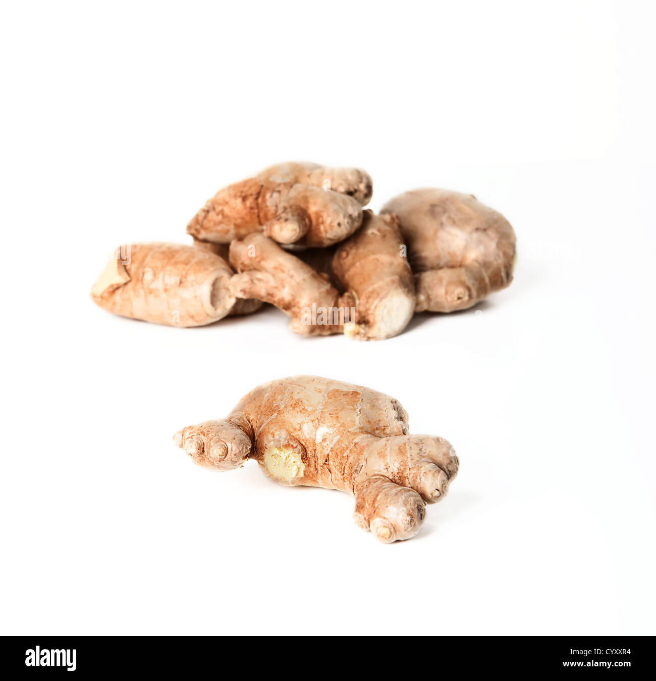 Raw ginger isolated on a pure white background Stock Photo - Alamy